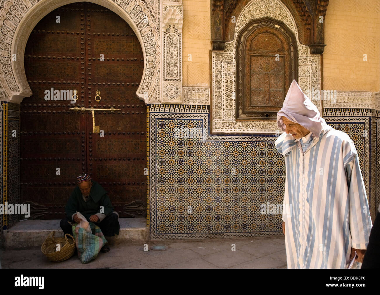 Fes, Morocco, Men in traditional costume in the Old Town Stock Photo ...