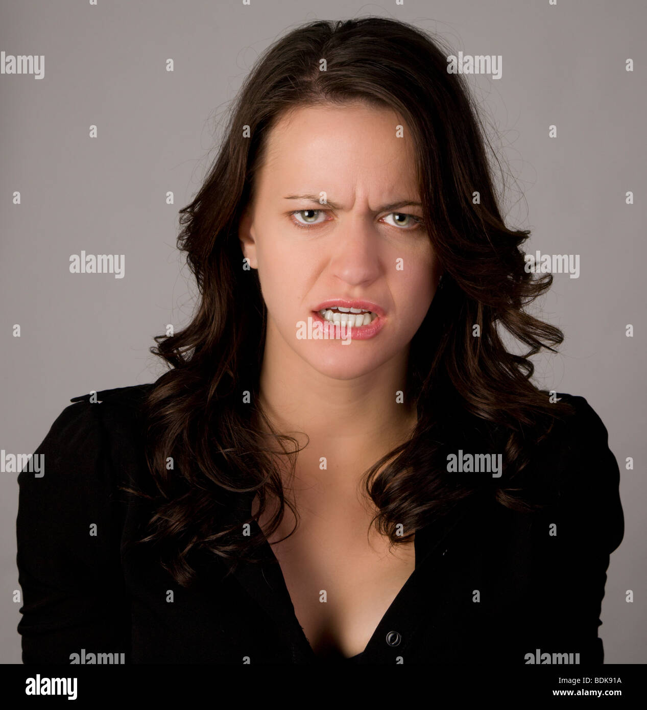 Woman angry expression grinding teeth hi-res stock photography and ...
