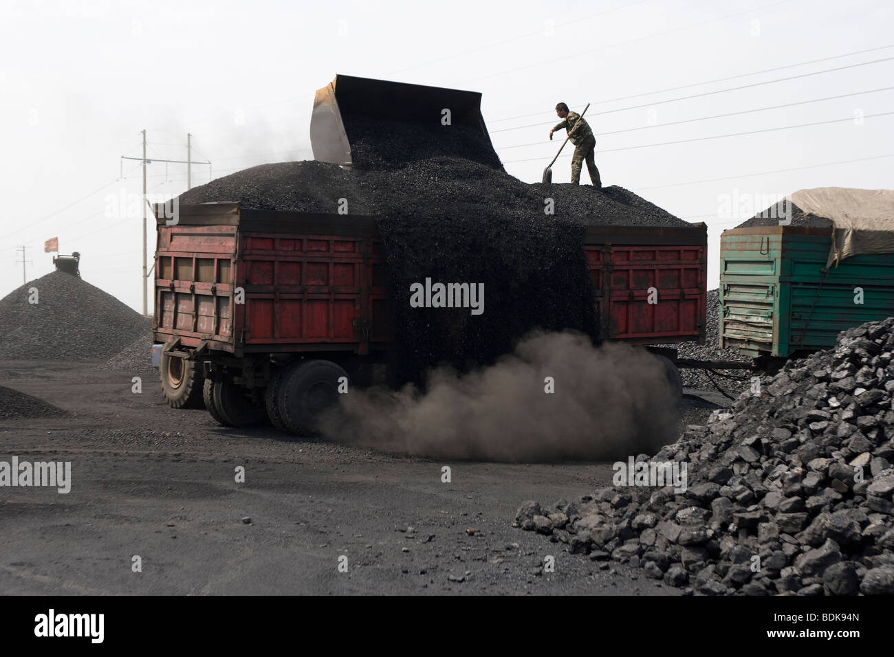 DATONG, SHANXI PROVINCE, CHINA - AUGUST 2007: A coal truck driver ...