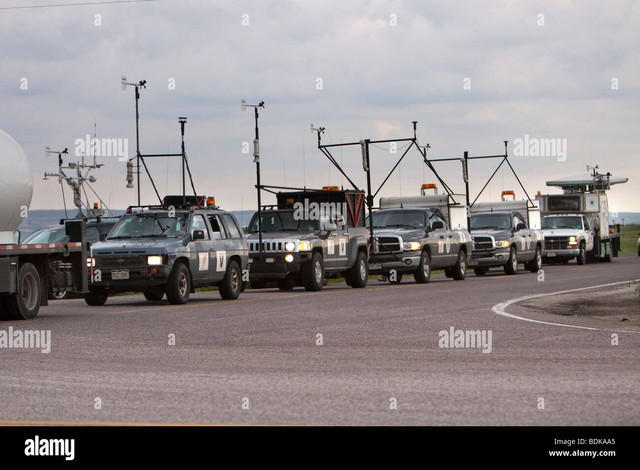 Vehicles participating in Project Vortex 2 line up at an intersection ...