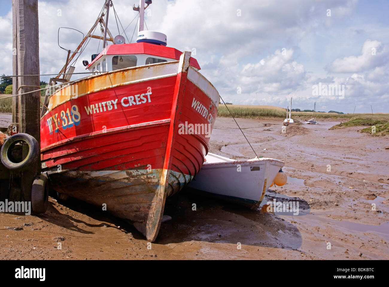 Fishing boat alongside dock hi-res stock photography and images - Alamy