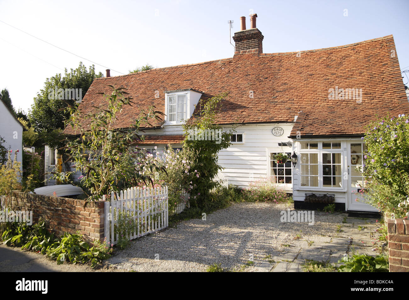 very old cottage,shore side mersea island,england uk.in landscape Stock ...