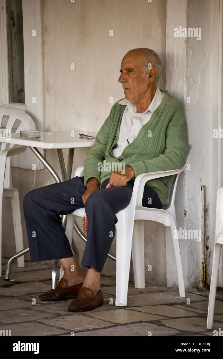 Greek island elderly table hi-res stock photography and images - Alamy