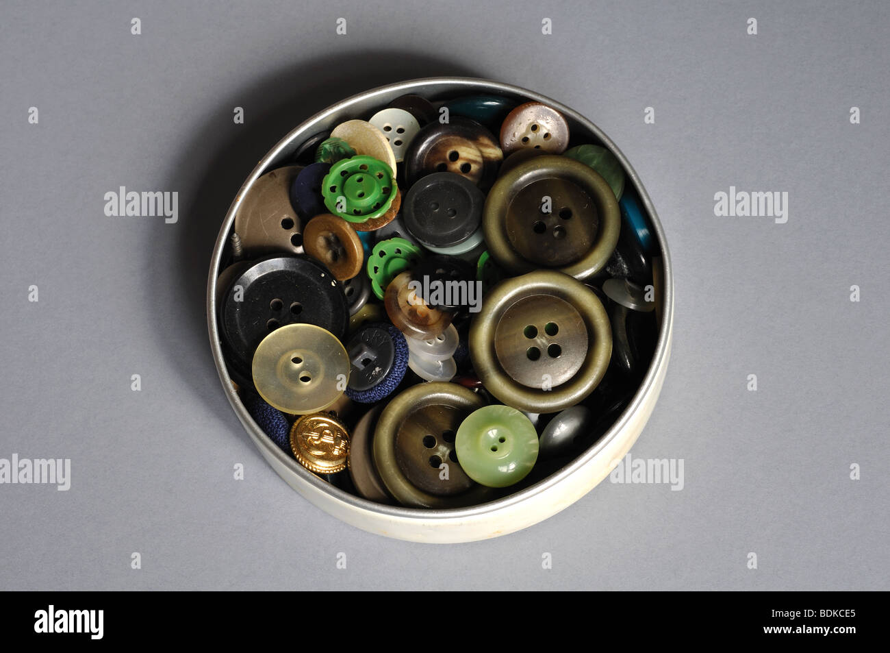 Tin of old buttons Stock Photo - Alamy