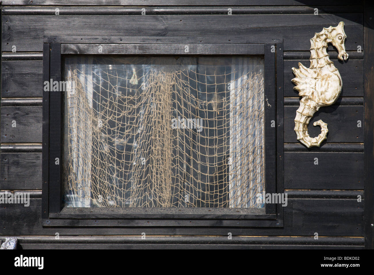 Fishing hut window and seahorse Stock Photo - Alamy