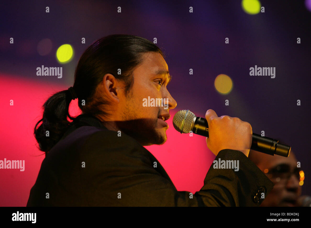 Singer on stage Stock Photo - Alamy