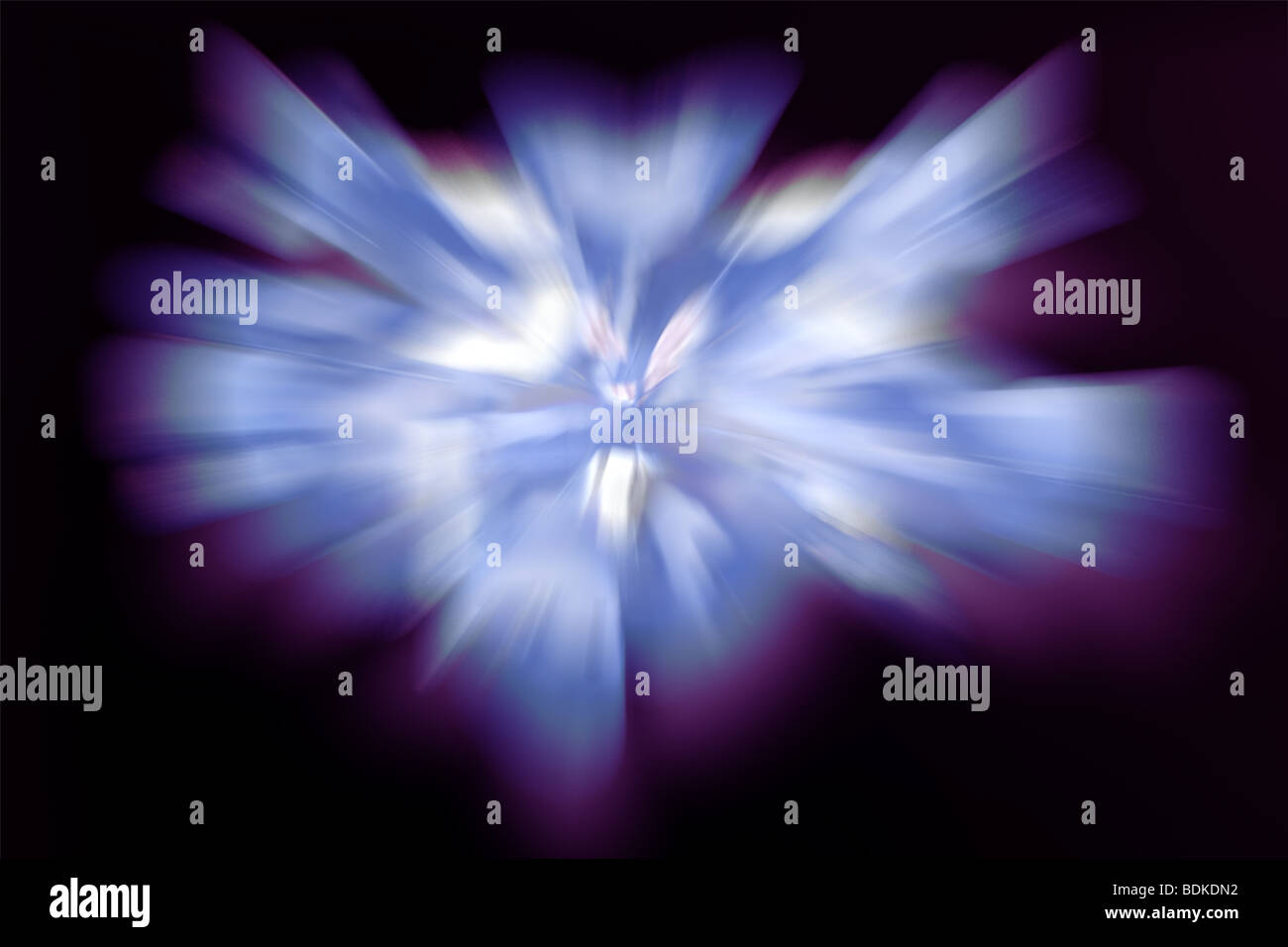 Abstract burst of light in space background Stock Photo - Alamy