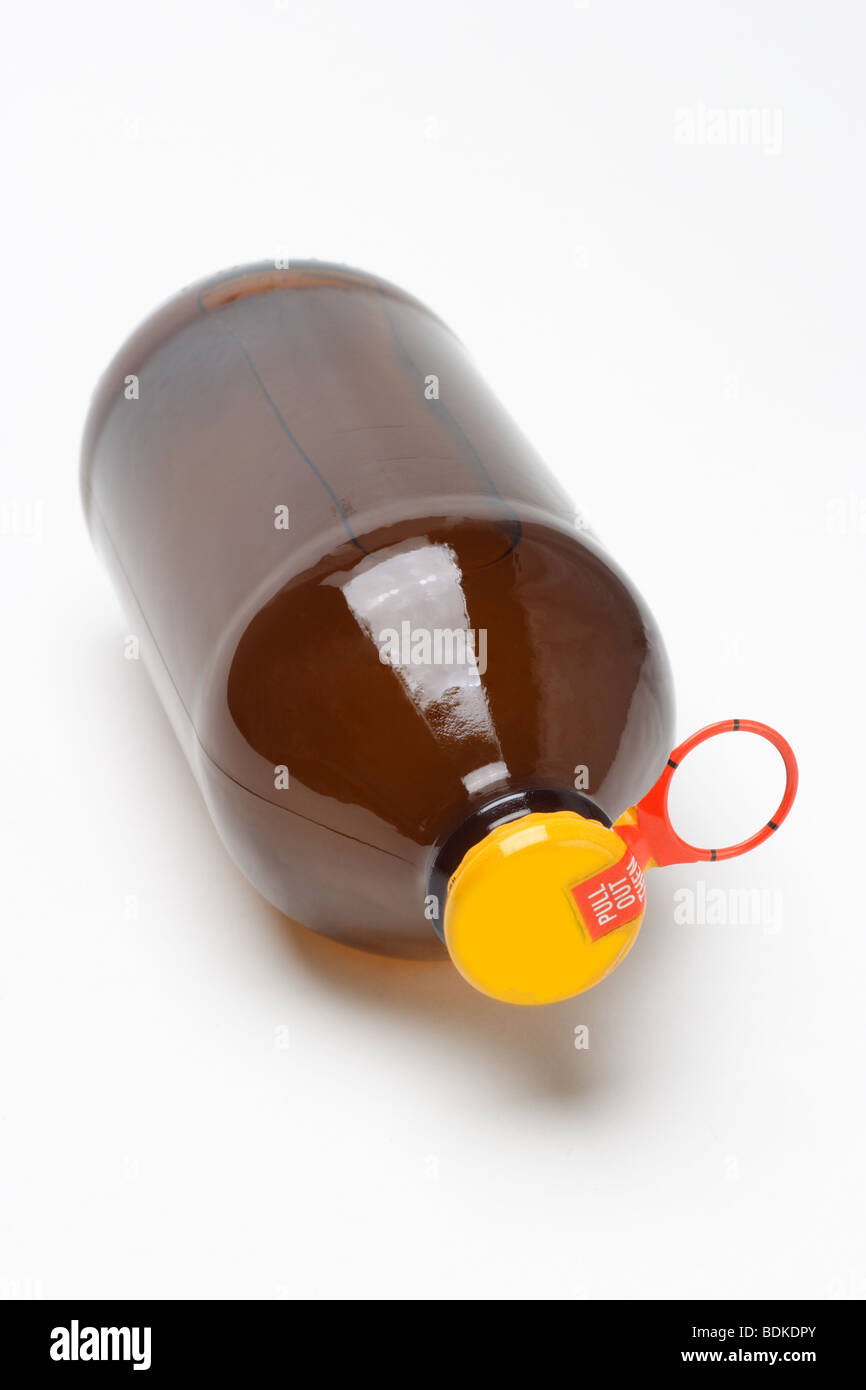 Bottle of fruit juice with yellow metal cap on white background Stock ...