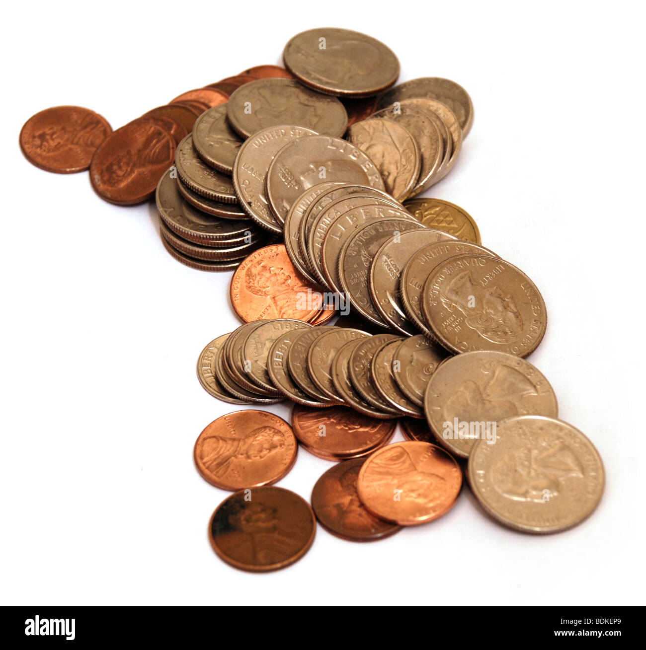 Piles of coins isolated on white background Stock Photo - Alamy