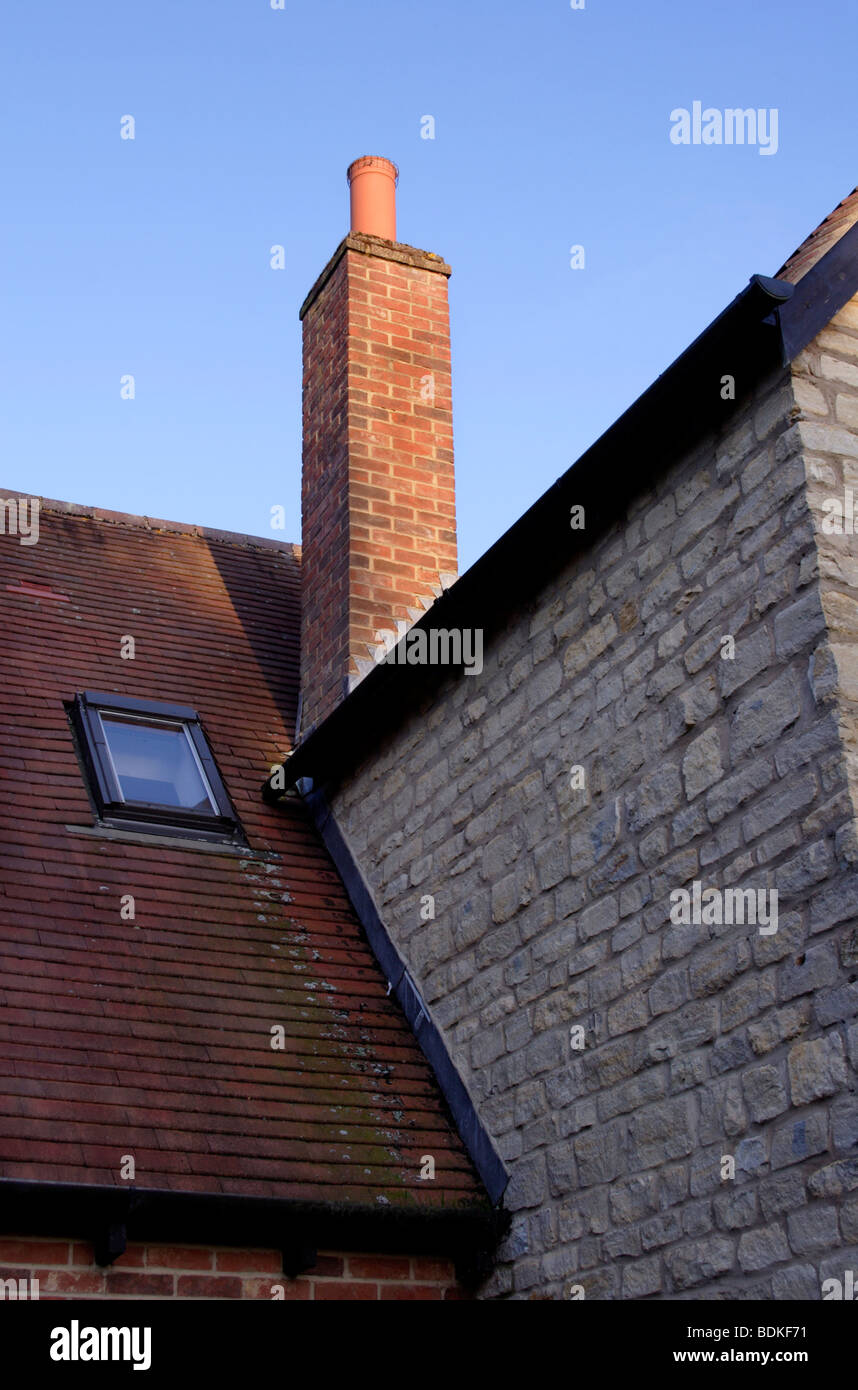 Chimney and window from house England UK Stock Photo - Alamy