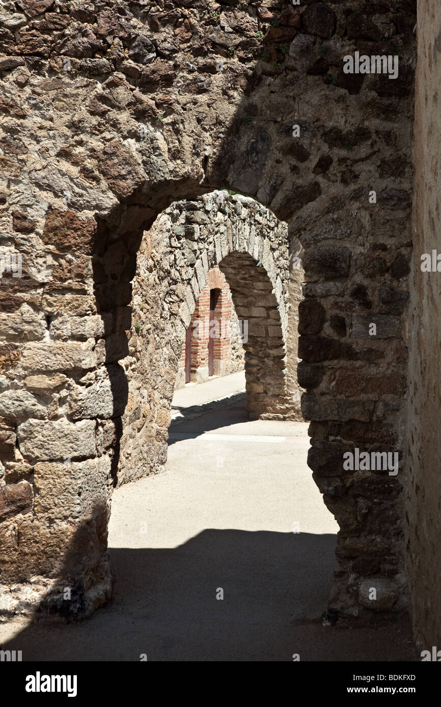 antique stone brick arch gallery Stock Photo - Alamy