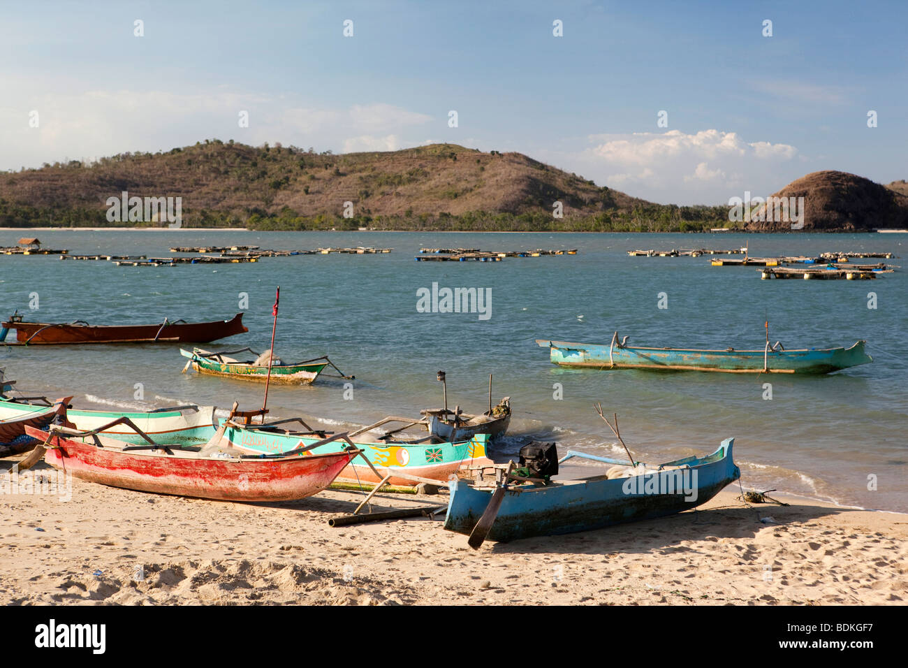 Indonesia, Lombok, Awang, traditional colourfully painted outrigger ...