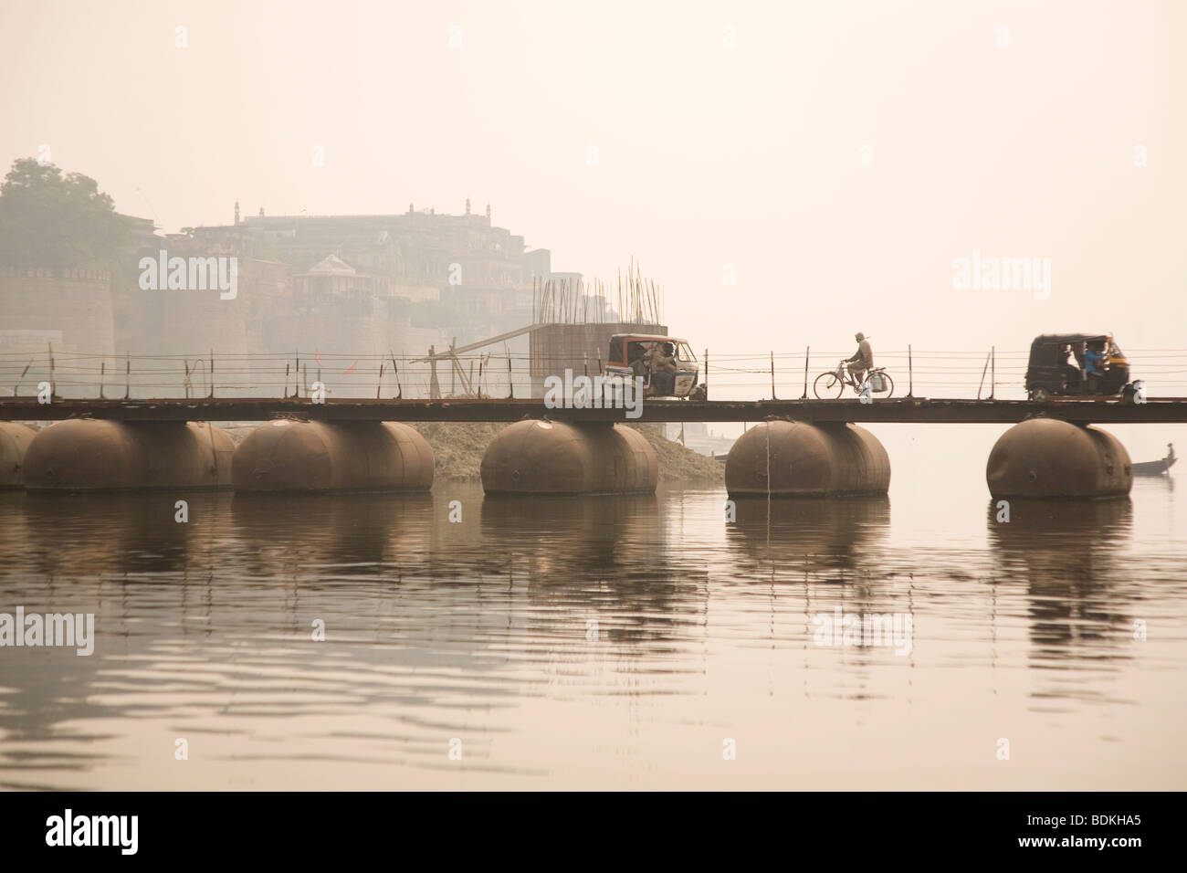 A pontoon bridge spans the banks of the Ganga (Ganges) river in ...