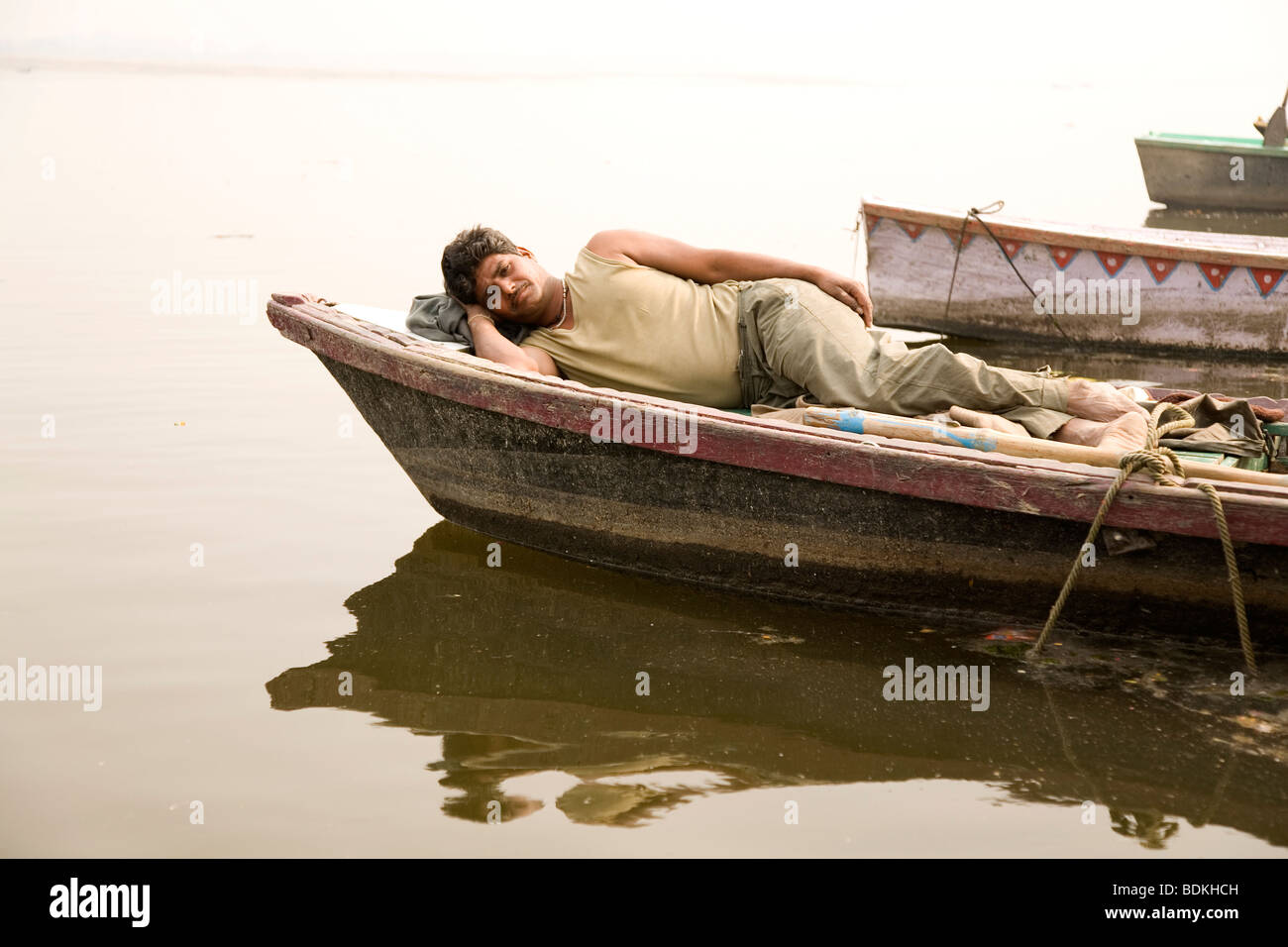 Indian man boatman rowing boat hi-res stock photography and images - Alamy