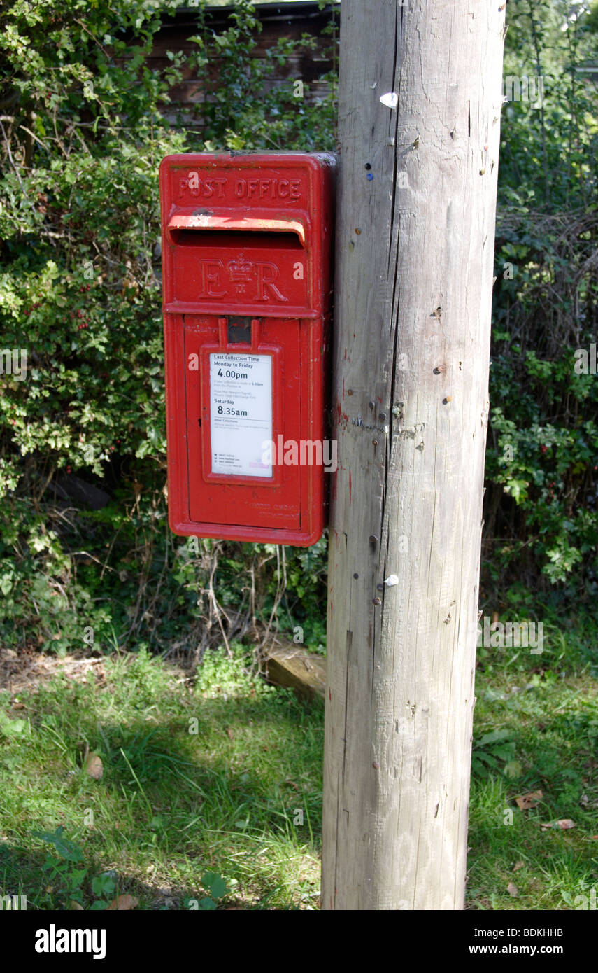 Post box attached to lamp post, England, UK Stock Photo - Alamy