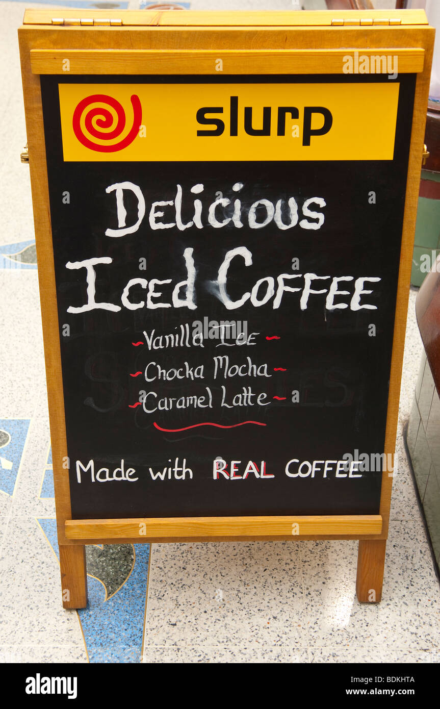 A sign advertising Iced Coffee in The Royal arcade indoor shopping ...