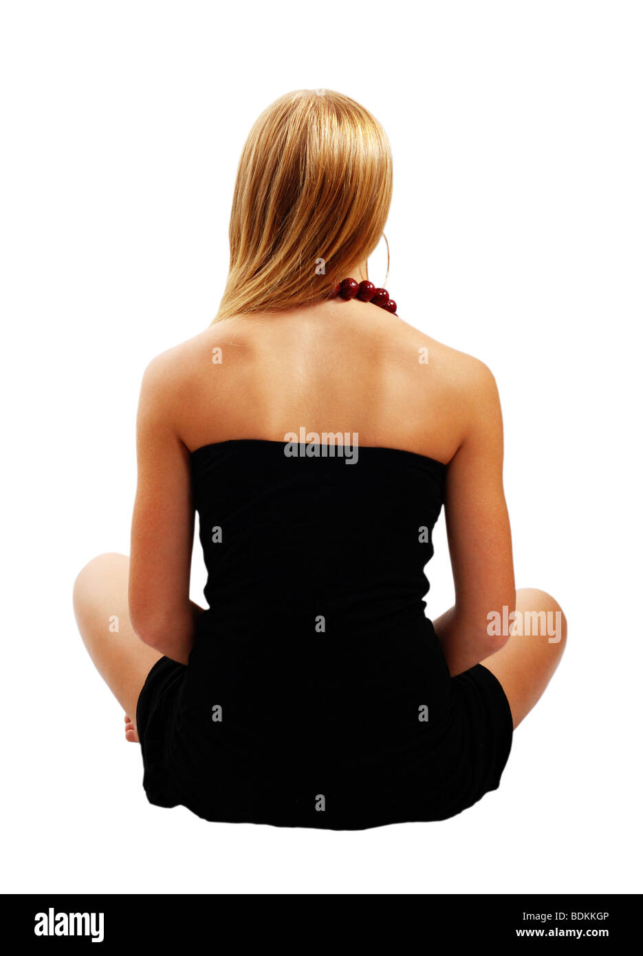 View of beautiful model in black dress from back isolated white ...