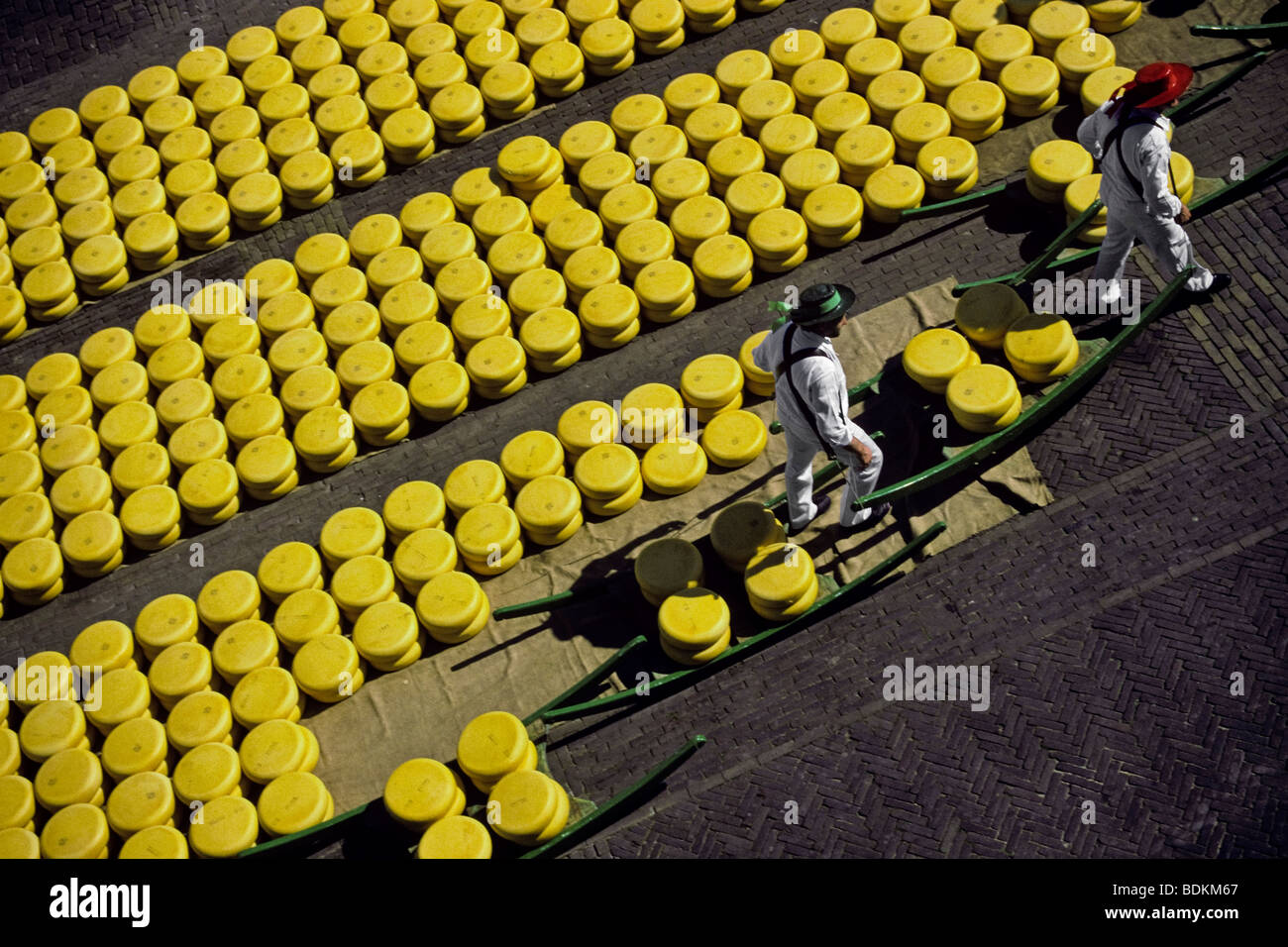 Holland, Alkmaar, High-angle view, men carrying cheese, Alkmaar Cheese ...