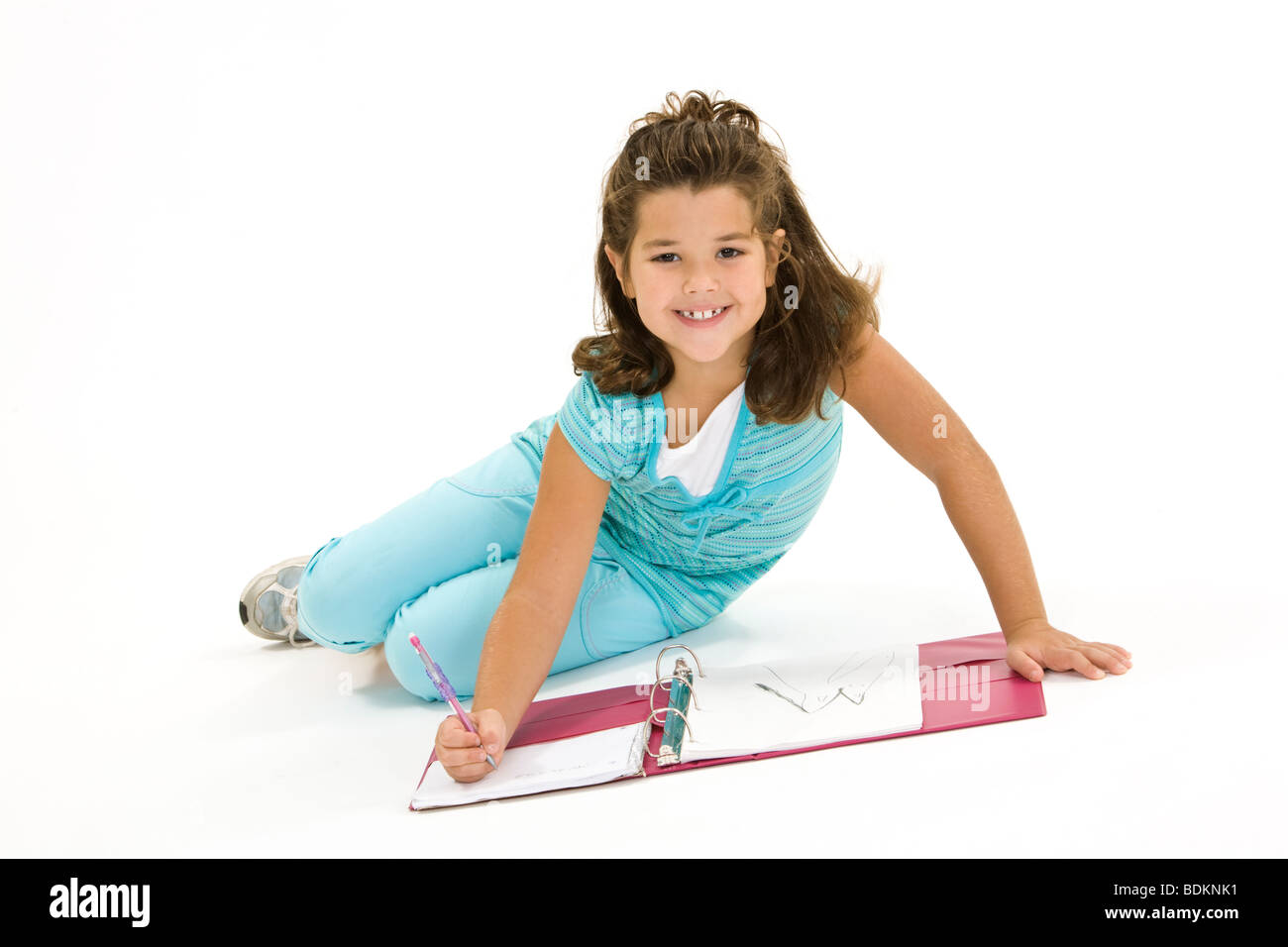 Child working on homework on white background Stock Photo - Alamy