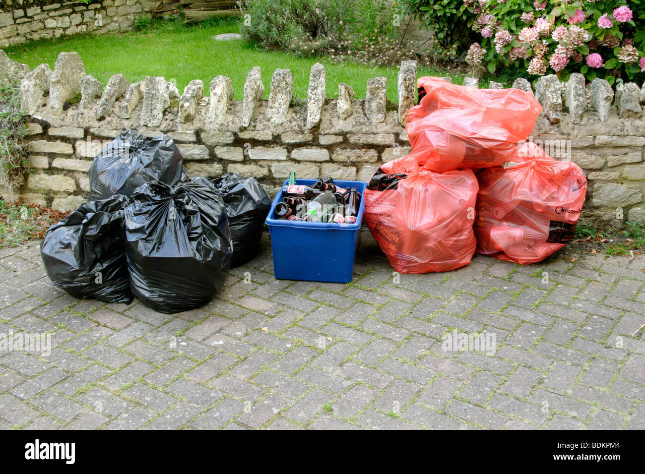 Domestic rubbish and recycling waiting for collection, England, UK ...