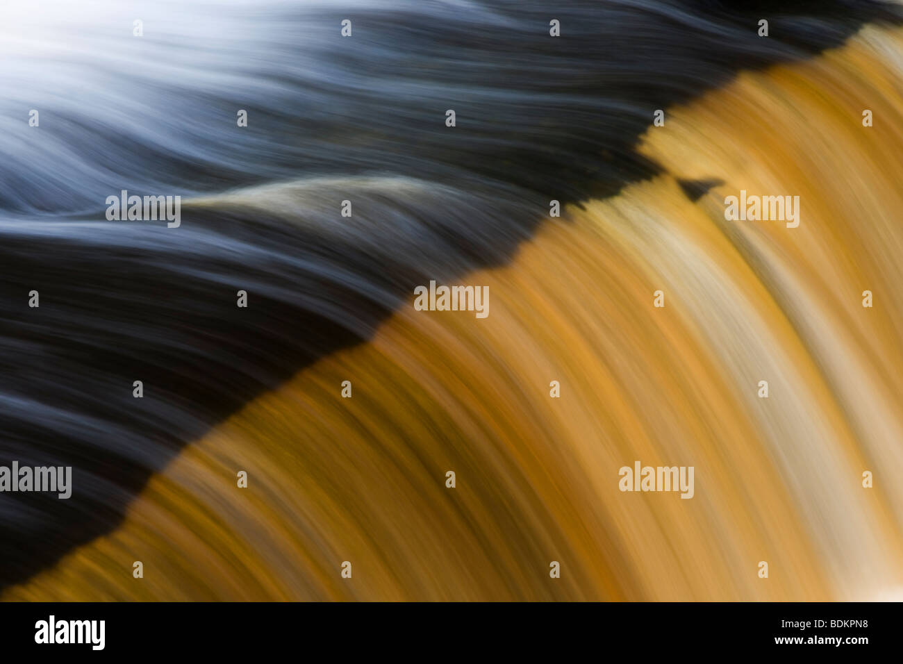 Close up detail of water flowing over the edge of Stainforth Force ...
