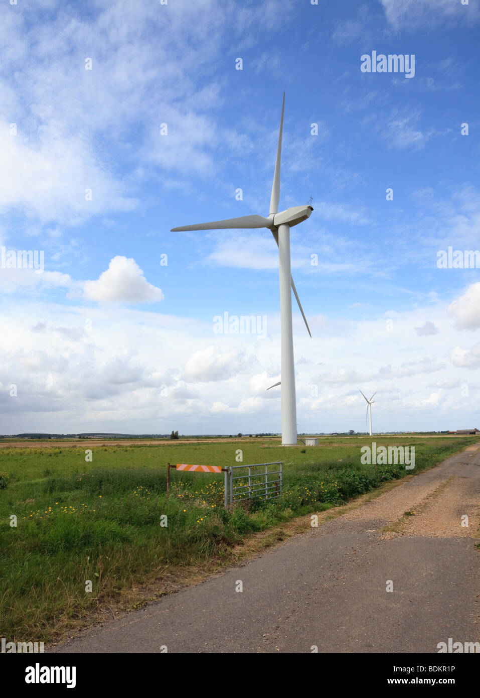 Modern windmills generating electricity next to the A141 in ...