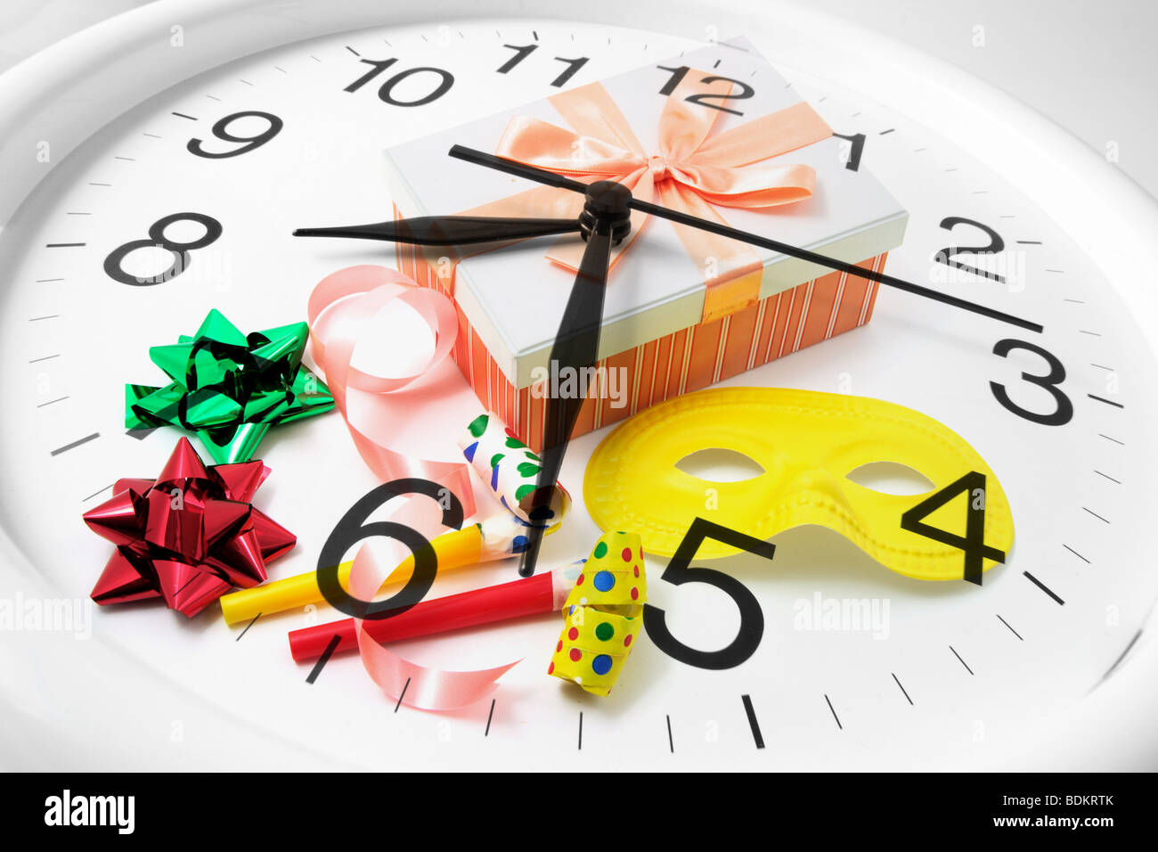 Clock and Party Favors Stock Photo - Alamy