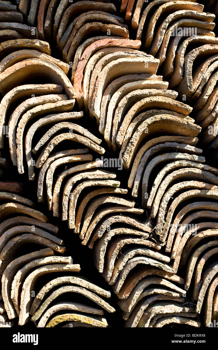 Roof tiles stacked in rural France August 2009 Stock Photo - Alamy
