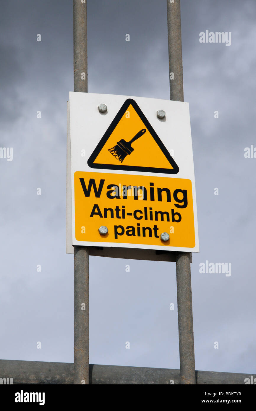 Sign advising railings are painted with anti-climb paint Stock Photo ...