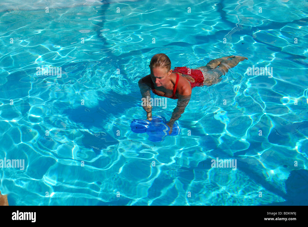 Fitness weights swimming pool hi-res stock photography and images - Alamy