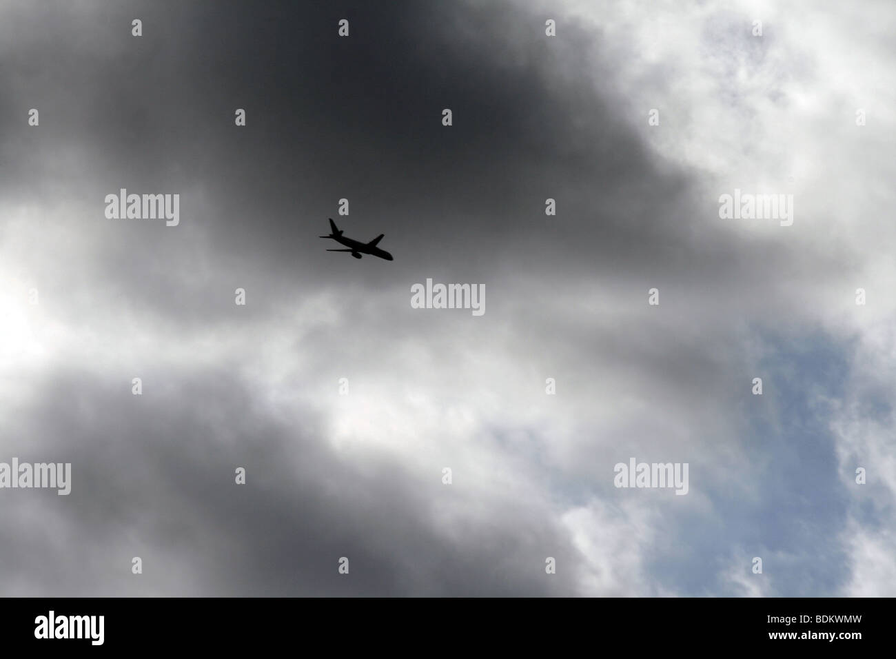Airplane flying through storm clouds hi-res stock photography and ...