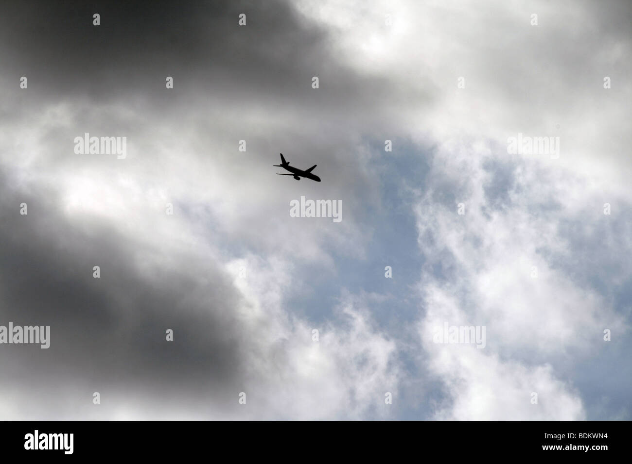 Airplane flying through storm clouds hi-res stock photography and ...
