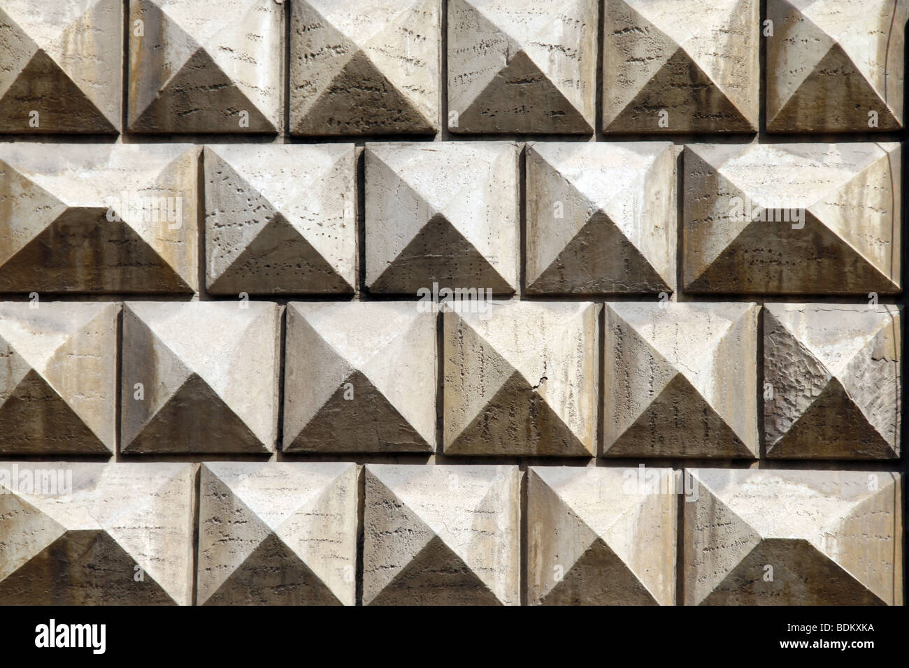 close up of triangular bricks wall in city town Stock Photo - Alamy