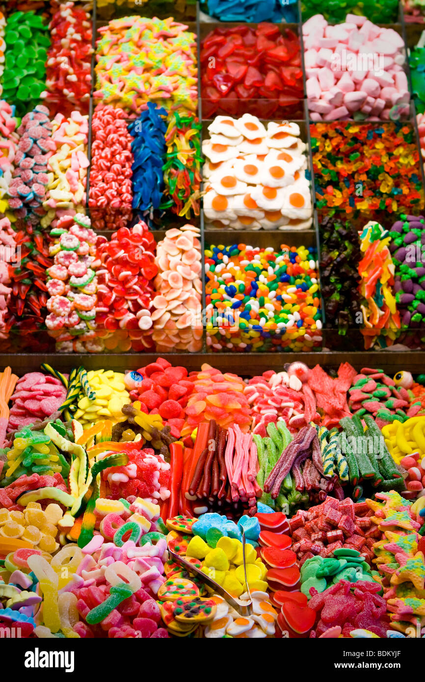 Mixed bins full of sweet candy Stock Photo - Alamy