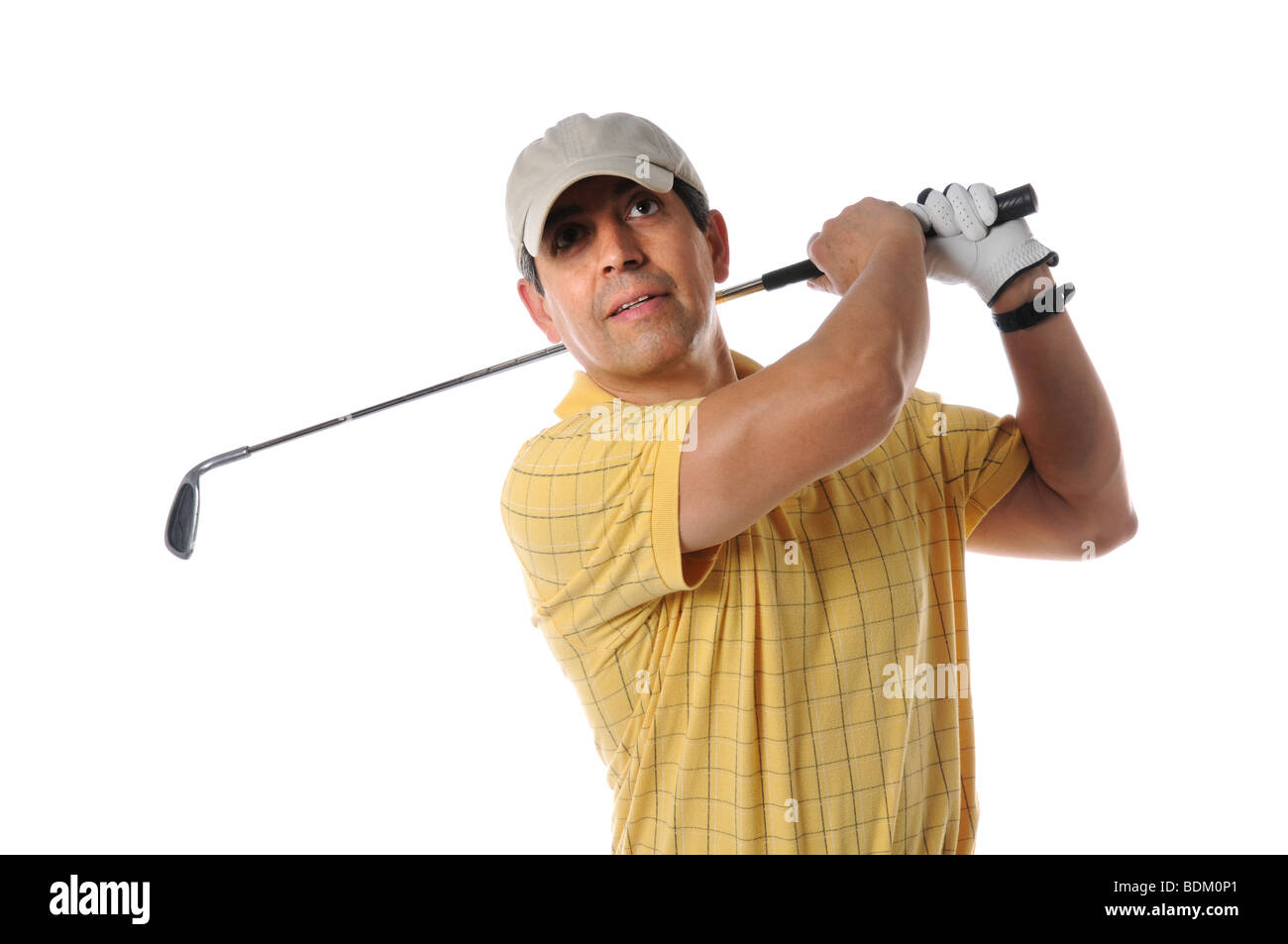 Gold player during after swing looking at the ball Stock Photo - Alamy