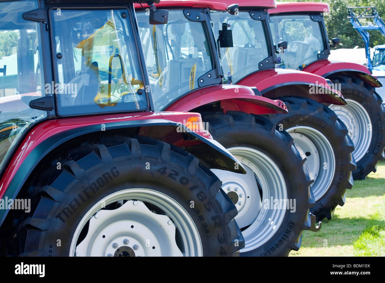 tractors lined up for sale at an agricultural show in Wales Stock Photo ...
