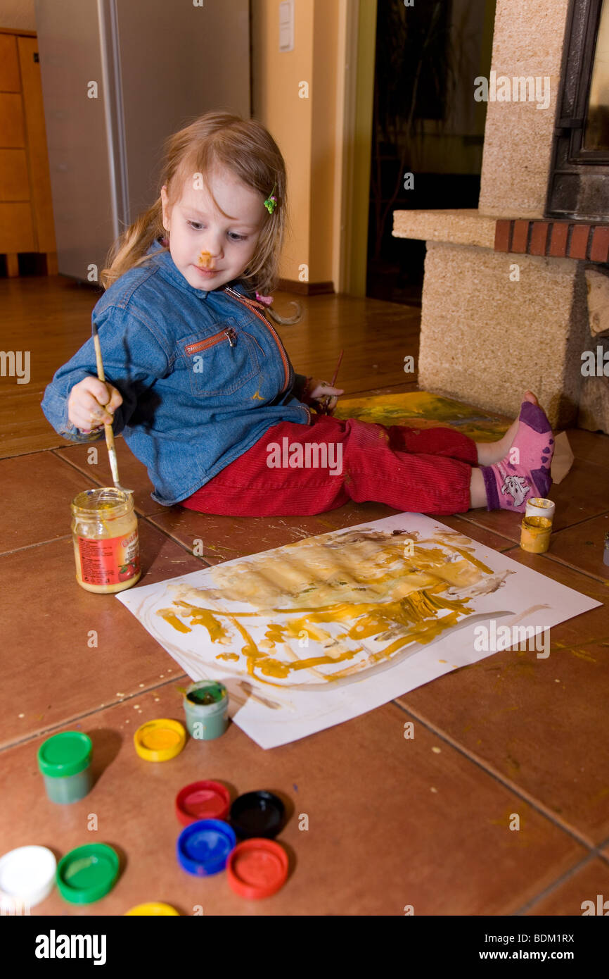 Three Year Old Girl Painting Stock Photo - Alamy