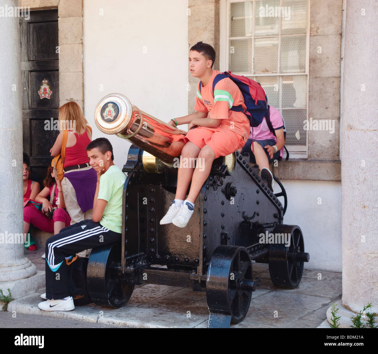 Gibraltar. School children waiting for changing of the Guard at the ...
