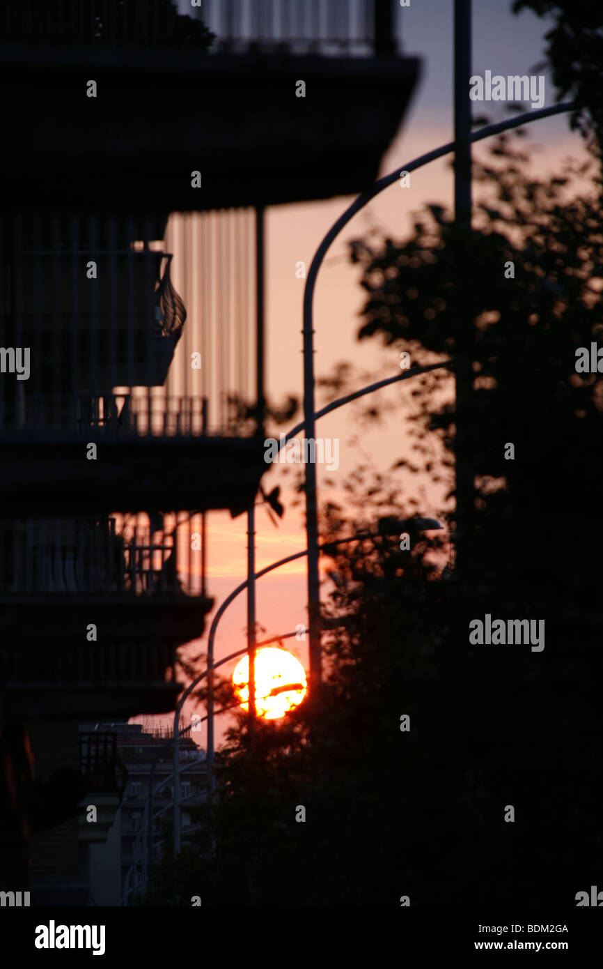 sunset over urban city landscape Stock Photo - Alamy