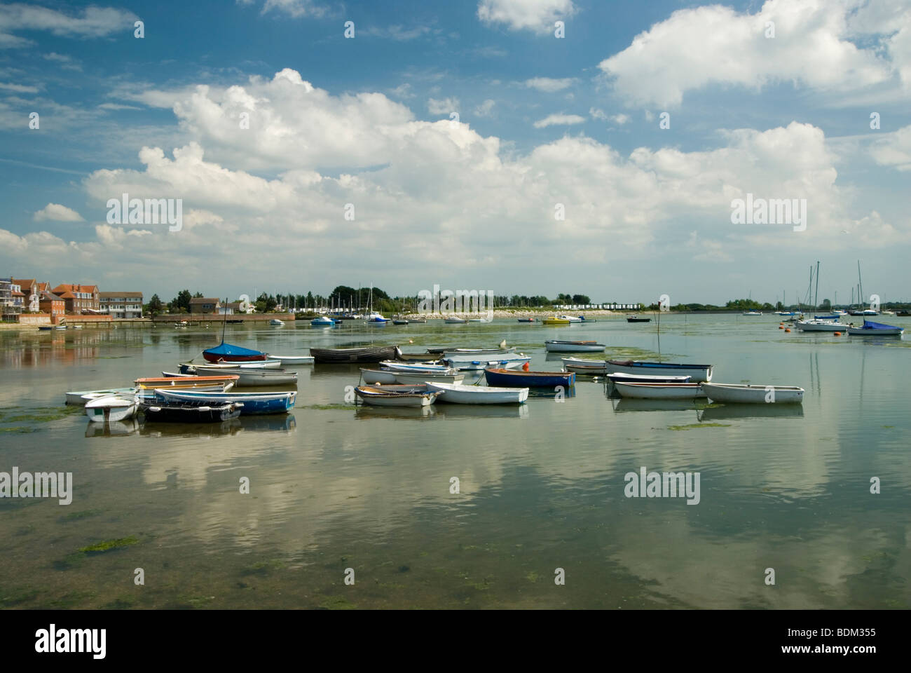 Emsworth quay on a still day from the tide mill with anchored boats and ...