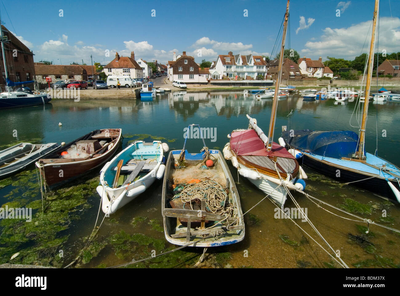 emsworth quay with boats tied up and still water Stock Photo - Alamy