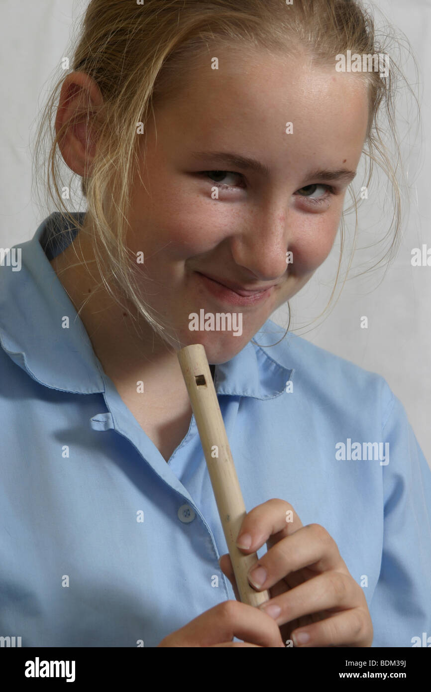Young Early Teenage Schoolgirl With Her Wooden Whistle Youth Social