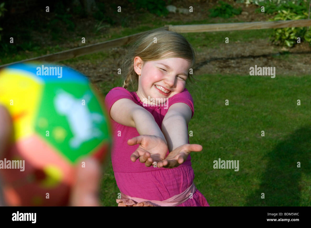 Children playing throw and catch ball hi-res stock photography and ...