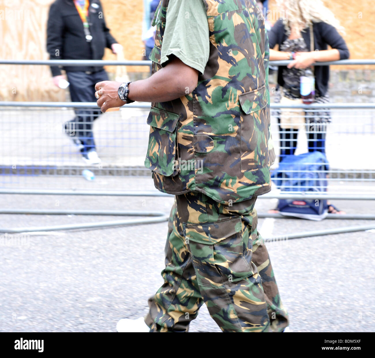 Soldier walking by Stock Photo - Alamy
