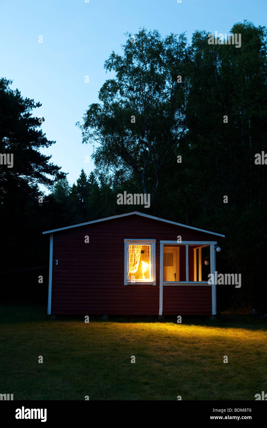 Camping cottage by night Stock Photo - Alamy