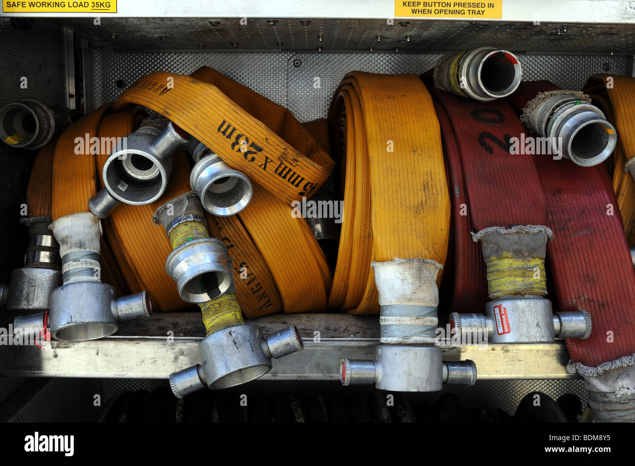 Rubber fire hose hi-res stock photography and images - Alamy
