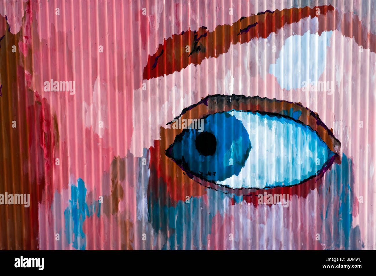 A street art painting of a face Stock Photo - Alamy