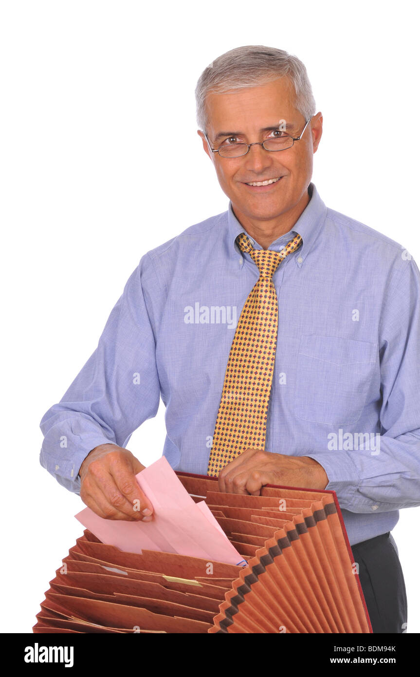 Smiling Businessman Putting Papers in File Box isolated on white Stock ...