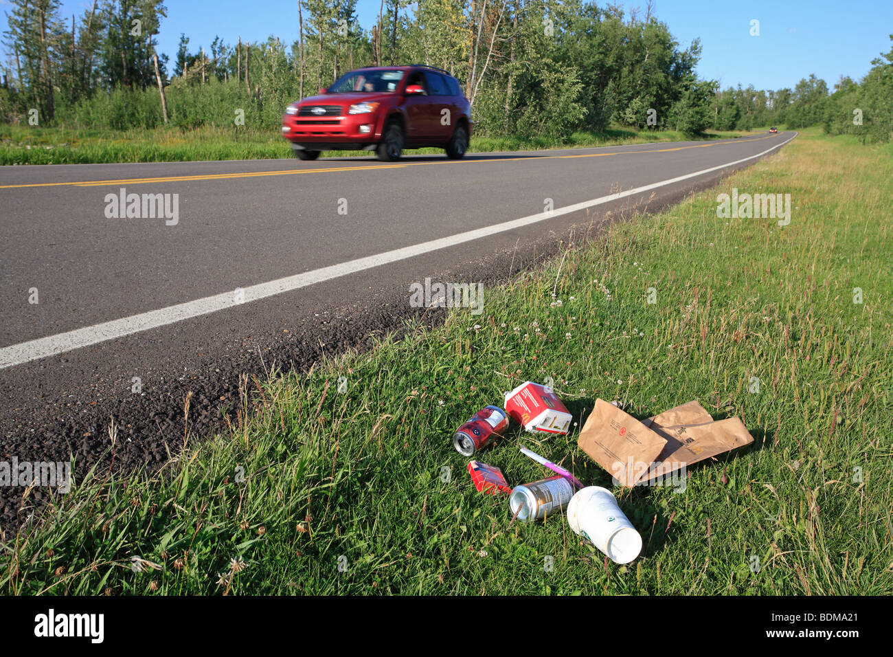 Roadside garbage Stock Photo - Alamy