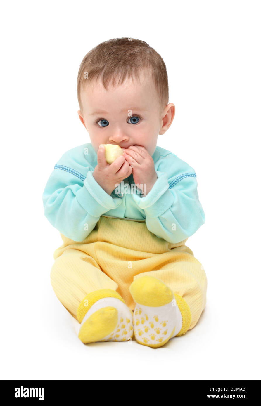 Child biting fruit Cut Out Stock Images & Pictures - Alamy